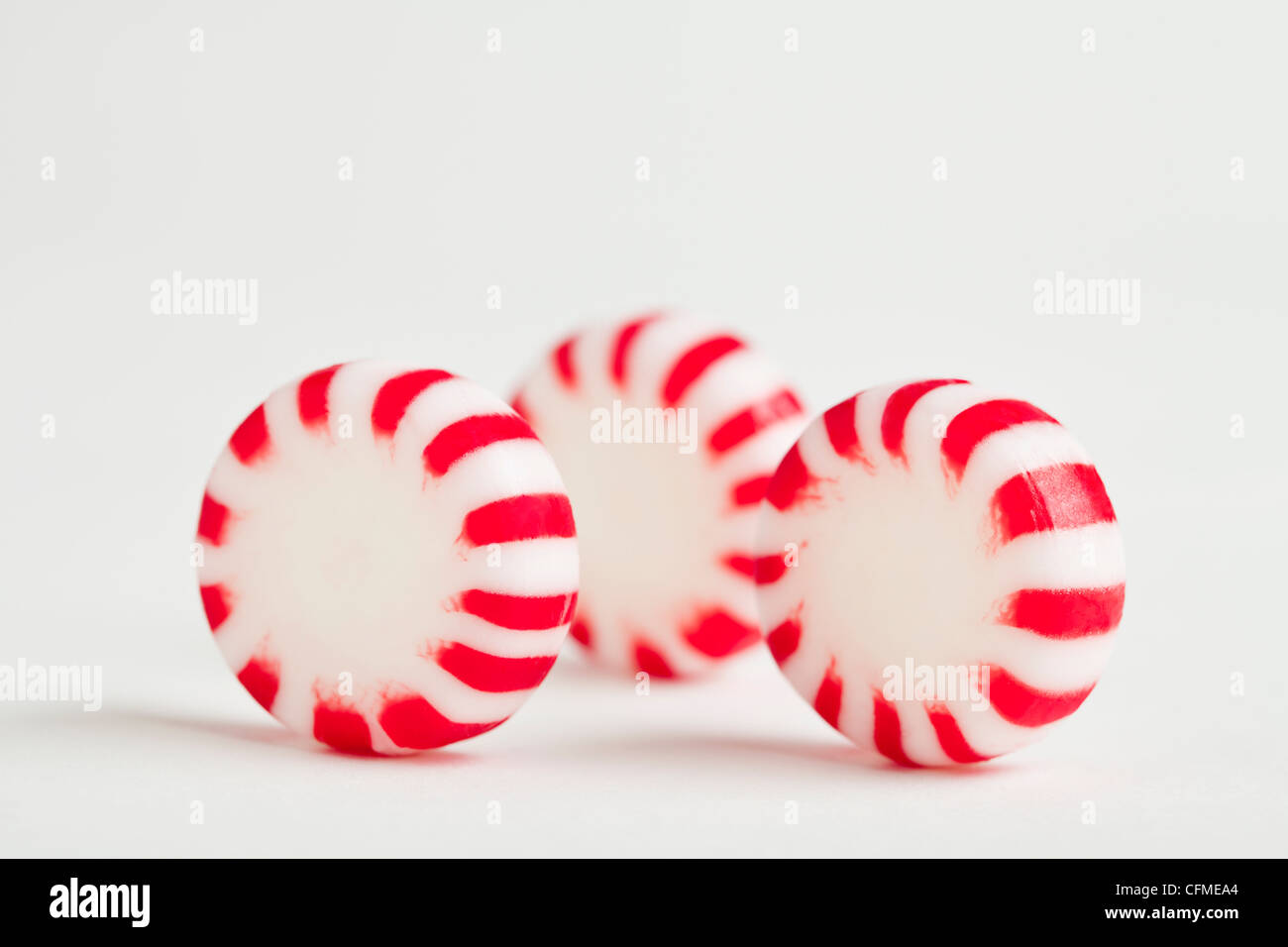 Red and white candies, studio shot Stock Photo - Alamy