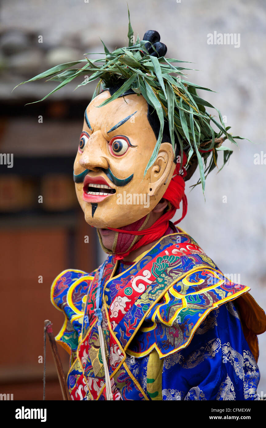 Monk wearing carved wooden mask, Wangdue Phodrang (Wangdi), Bhutan ...