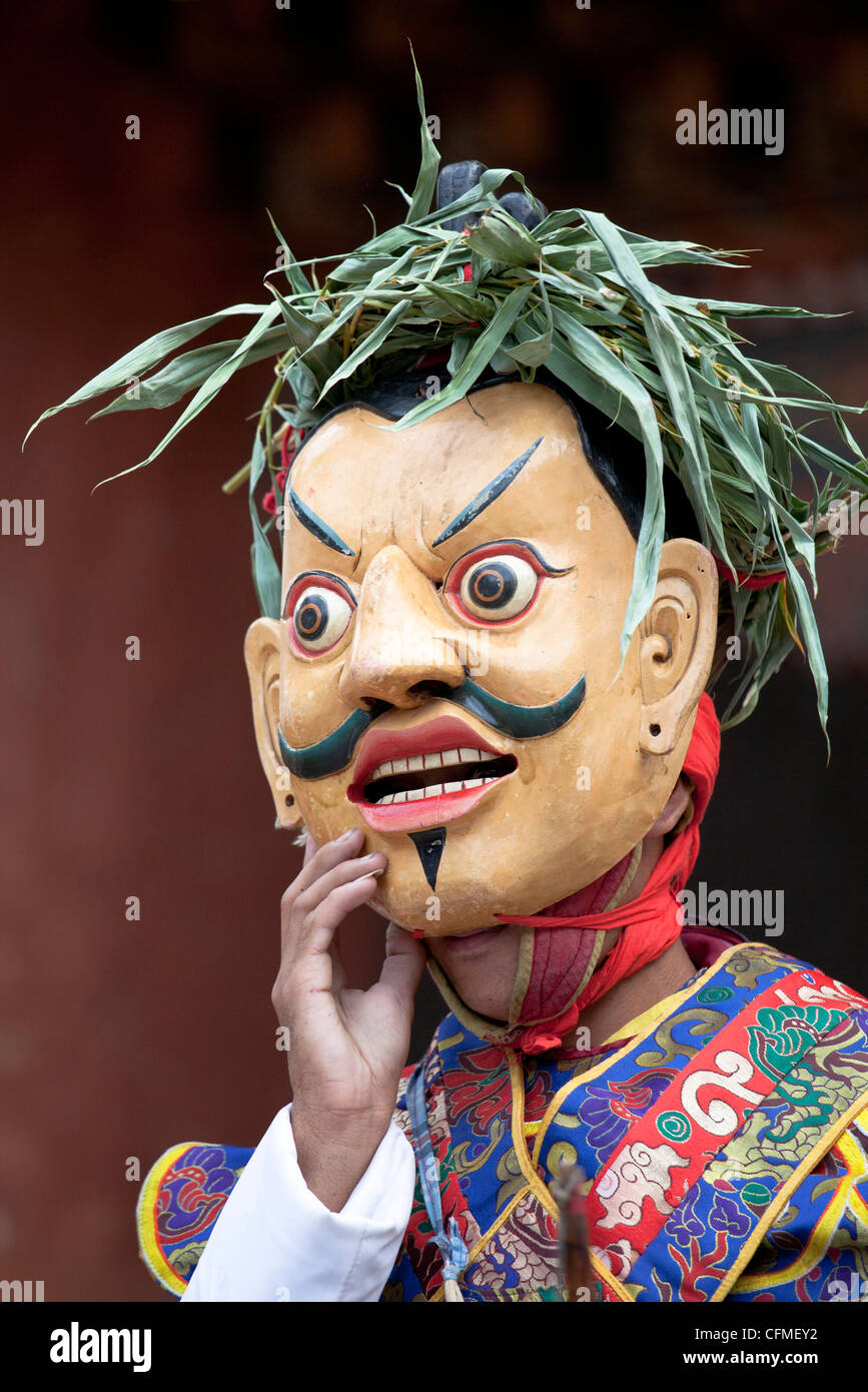 Monk wearing carved wooden mask hi-res stock photography and images - Alamy