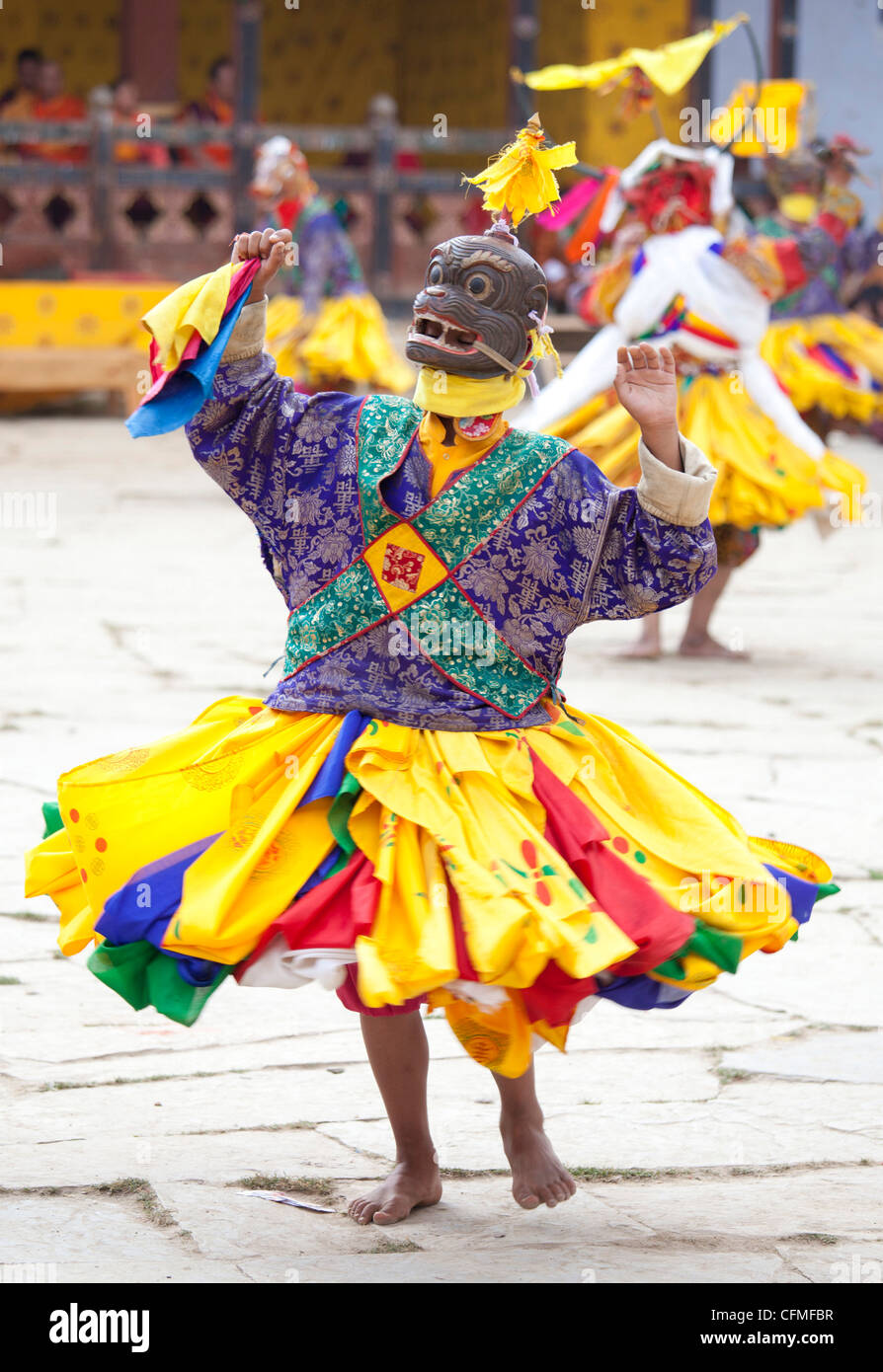 Buddhist monks performing masked dance during the Gangtey Tsechu at ...