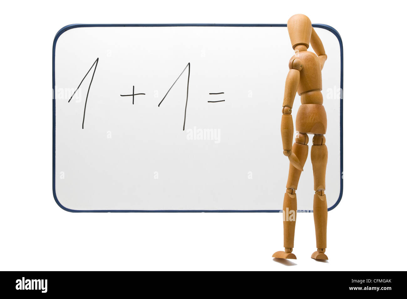Wooden figure tries hard to find solution for complex problem Stock ...