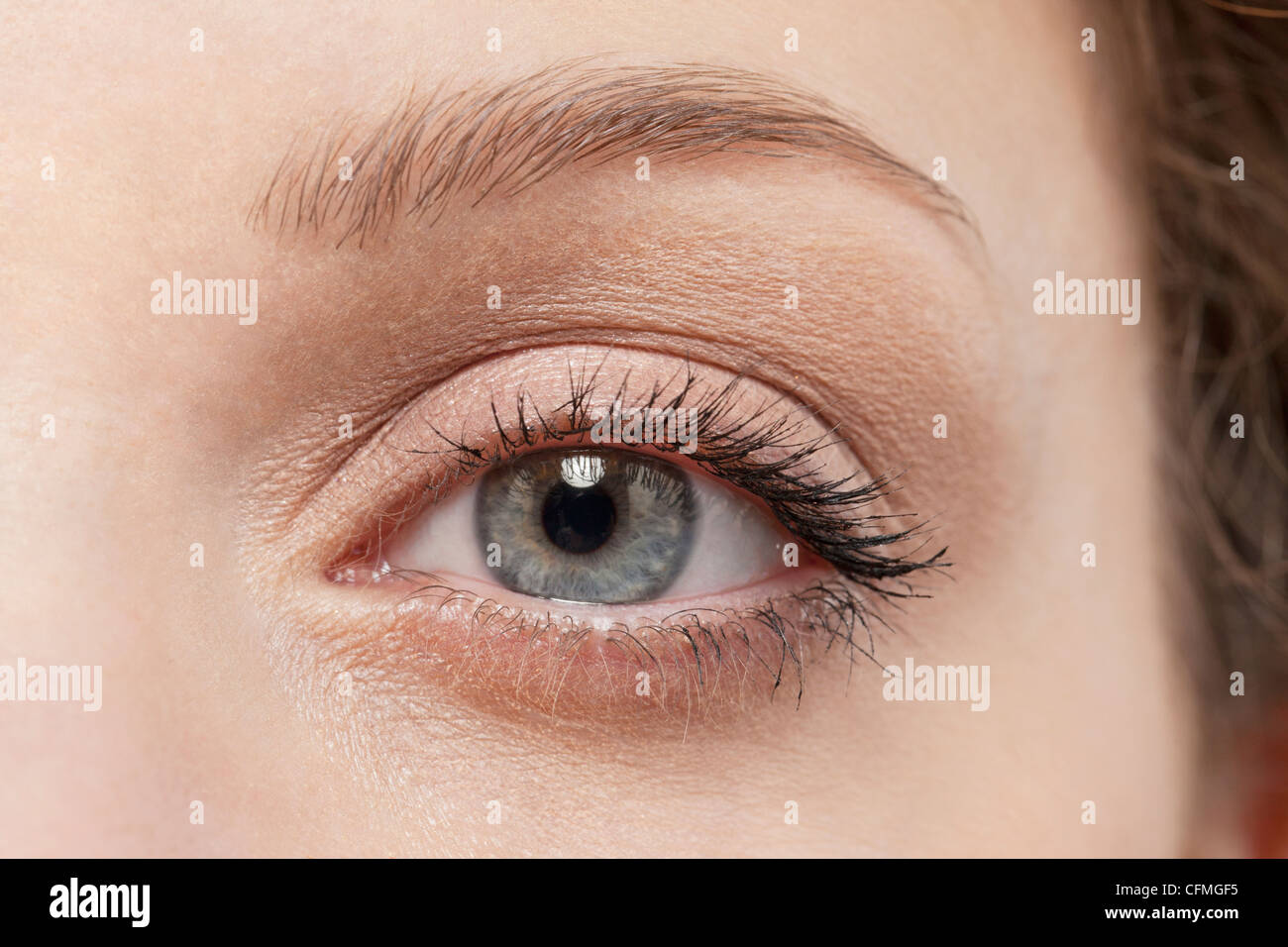 Close up of woman's eye, studio shot Stock Photo - Alamy