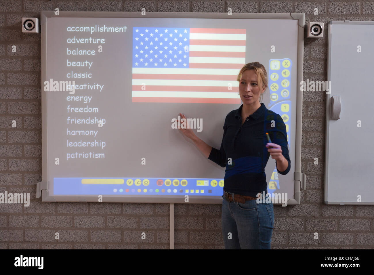 Netherlands, Goirle, Teacher giving instructions at digital board Stock ...