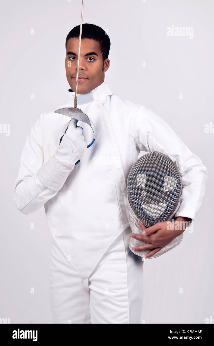 Male fencer isolated in a light background Stock Photo - Alamy
