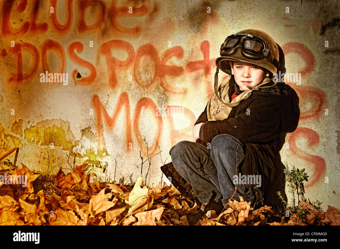 Young boy in a war zone crying for help Stock Photo - Alamy