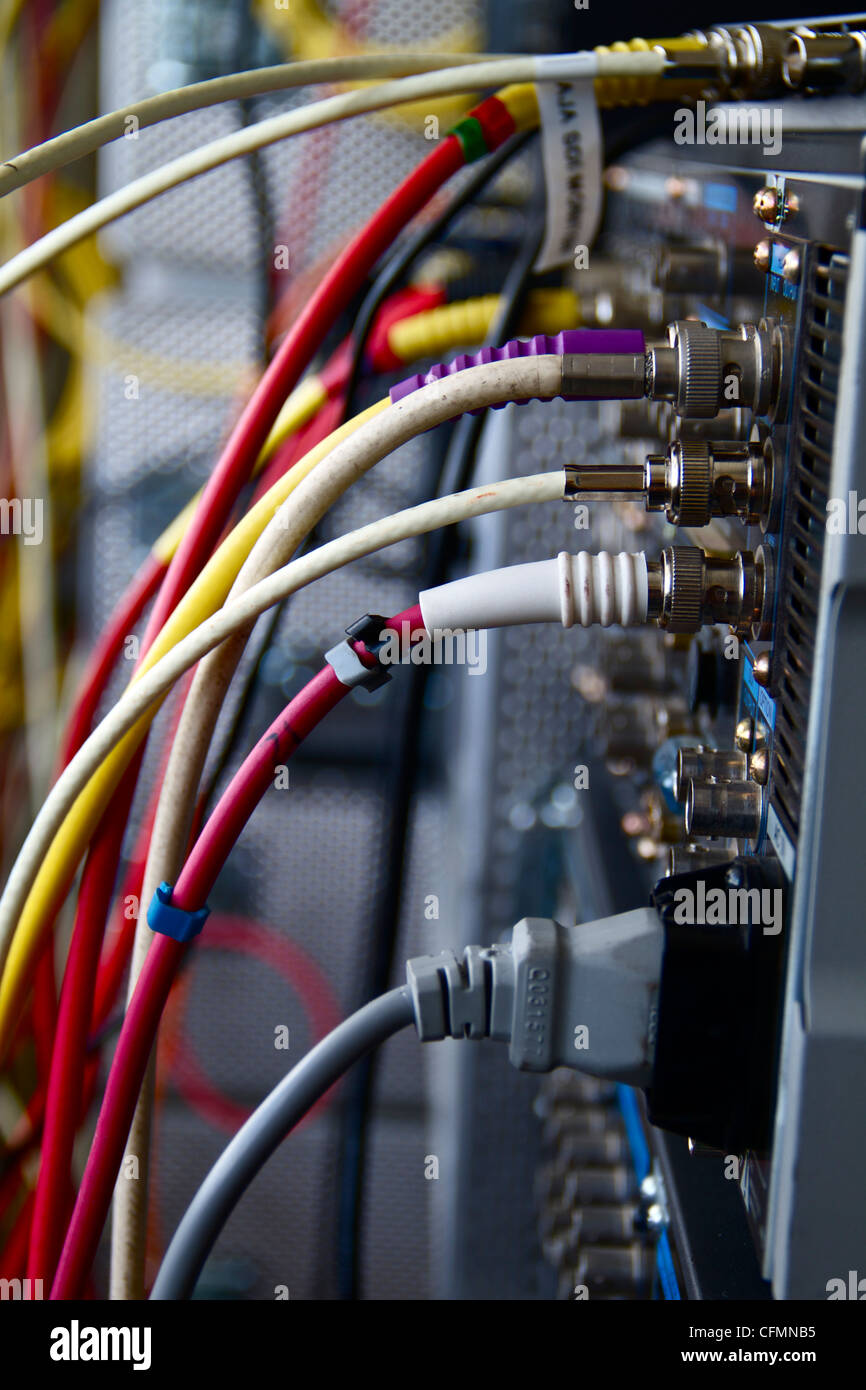 Broadcast video cables plugged into broadcast video equipment CMD Photo ...