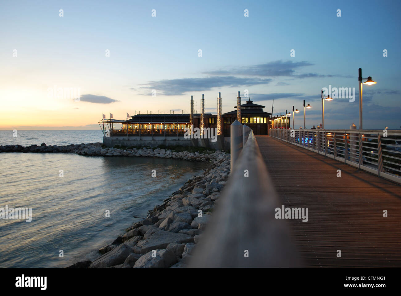 Marina structure facing the sea at sunset, Rimini, Emilia Romagna ...