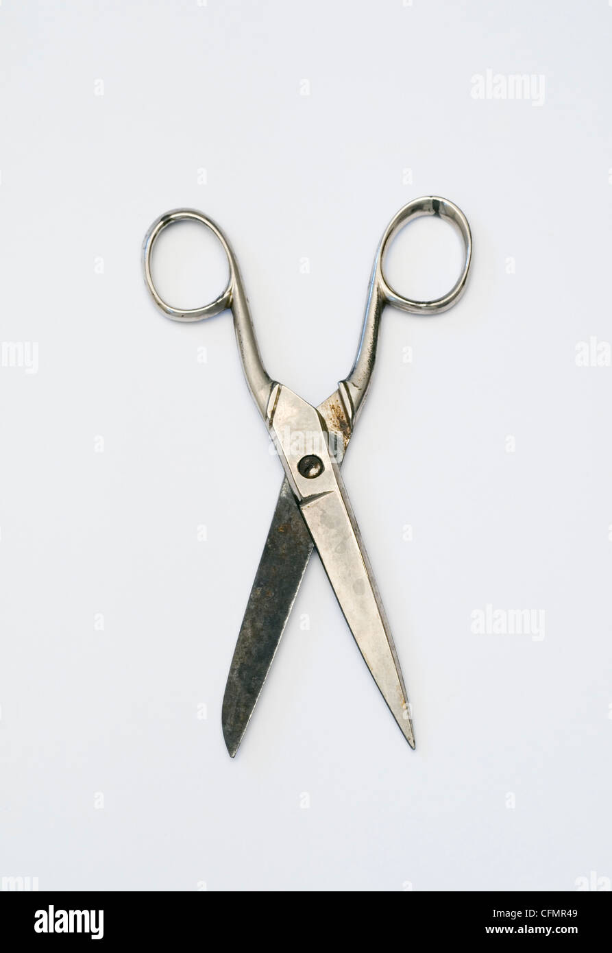 old scissors on white background Stock Photo - Alamy