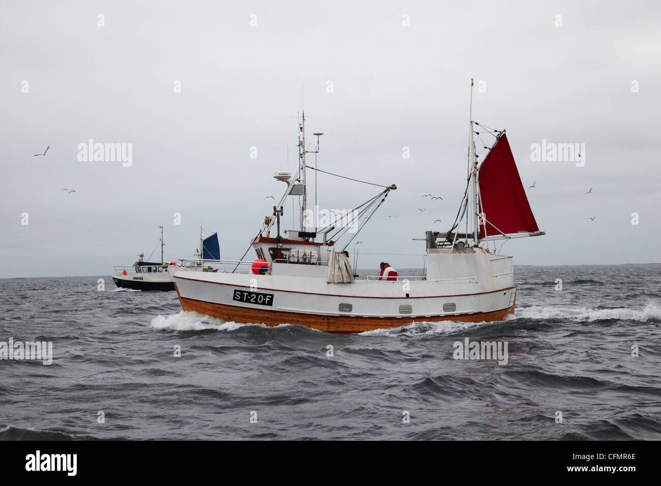 Fishing Boats on their way to the fishing spots Stock Photo - Alamy