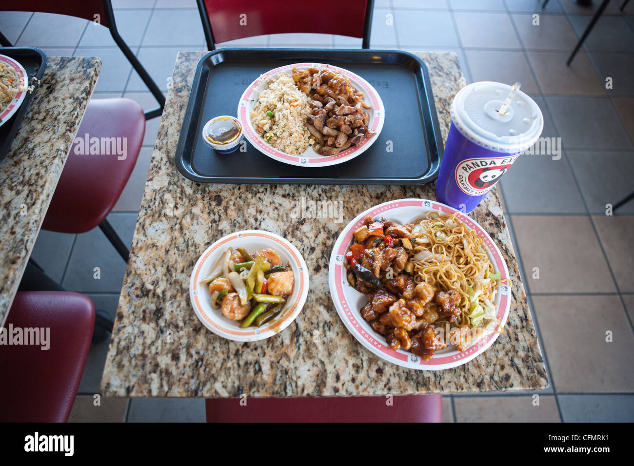 A table of food with Chinese American fast food including fried rice ...