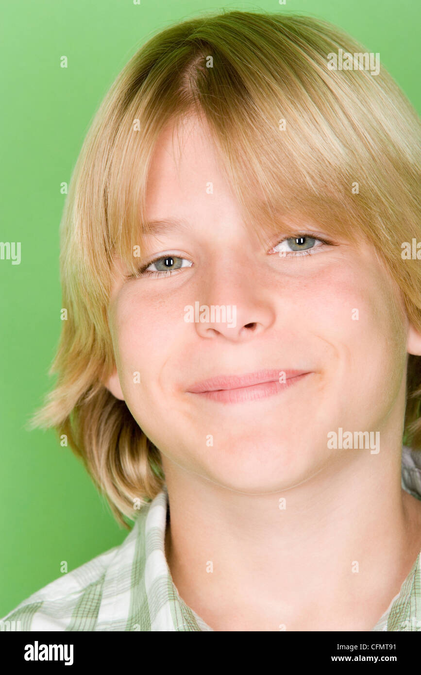 Studio shot portrait of teenage boy, close-up Stock Photo - Alamy