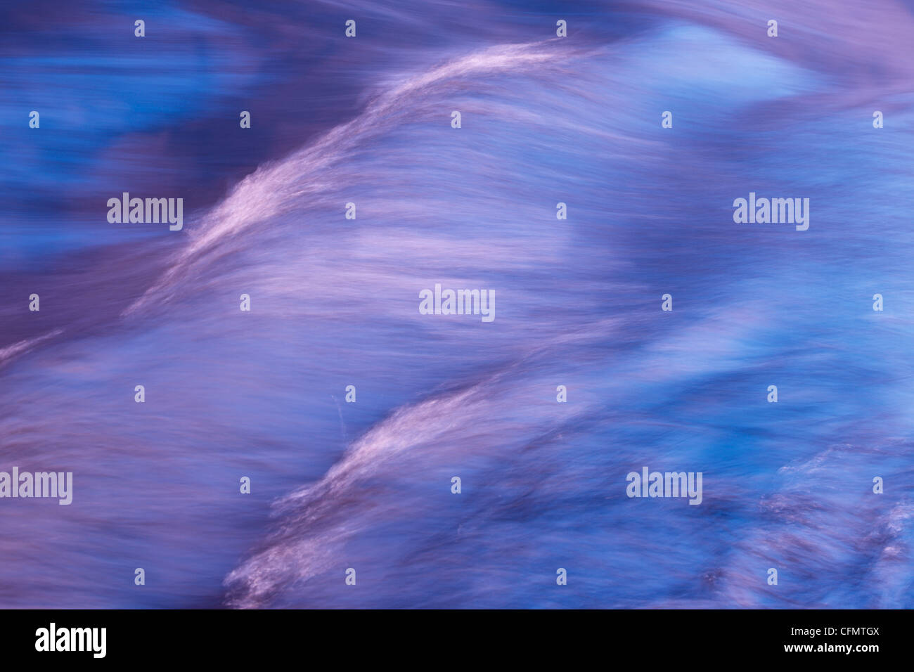 Brightly colored detail of water flowing through The Strid on the River ...