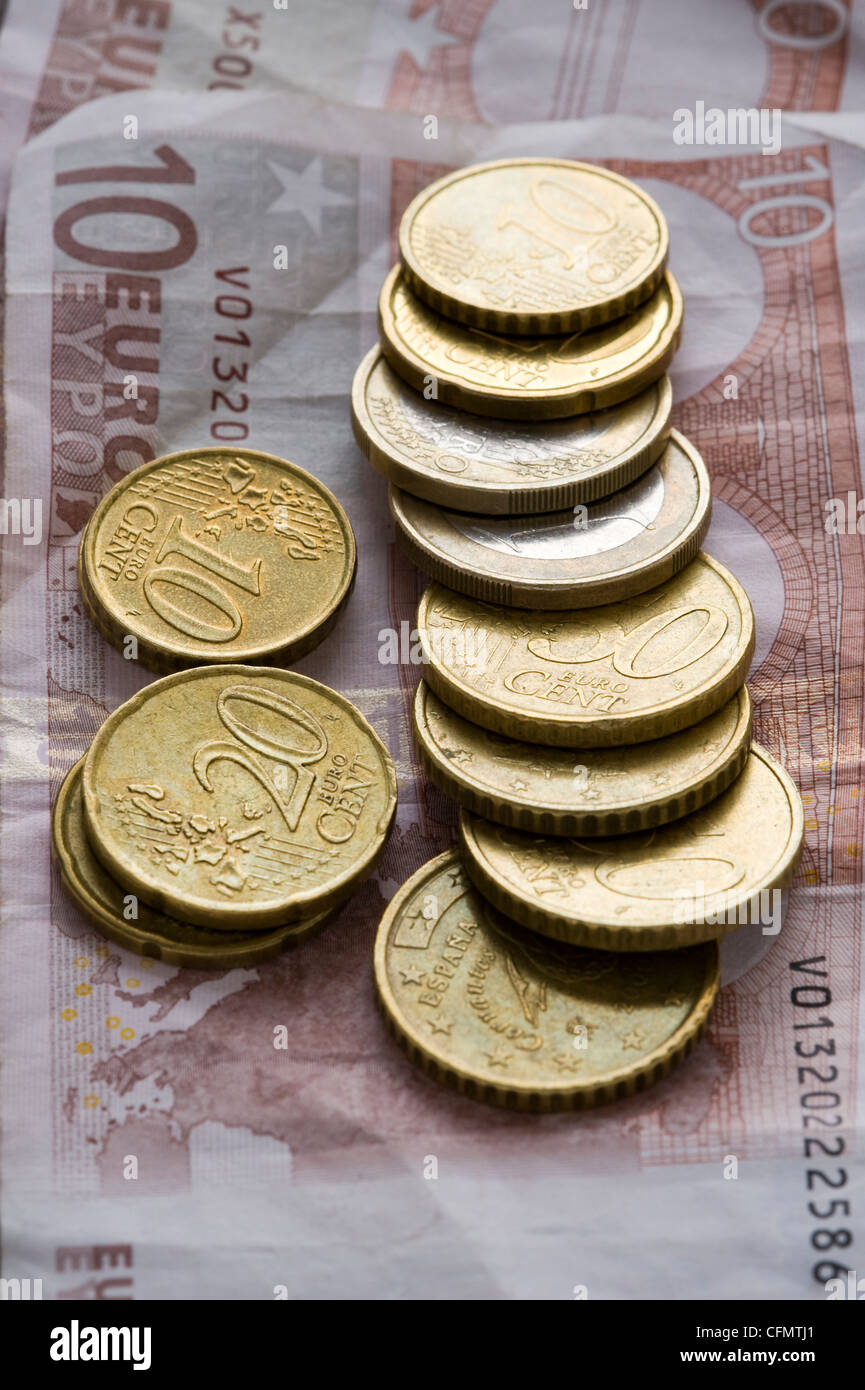 ten euro notes with euro coins Stock Photo - Alamy