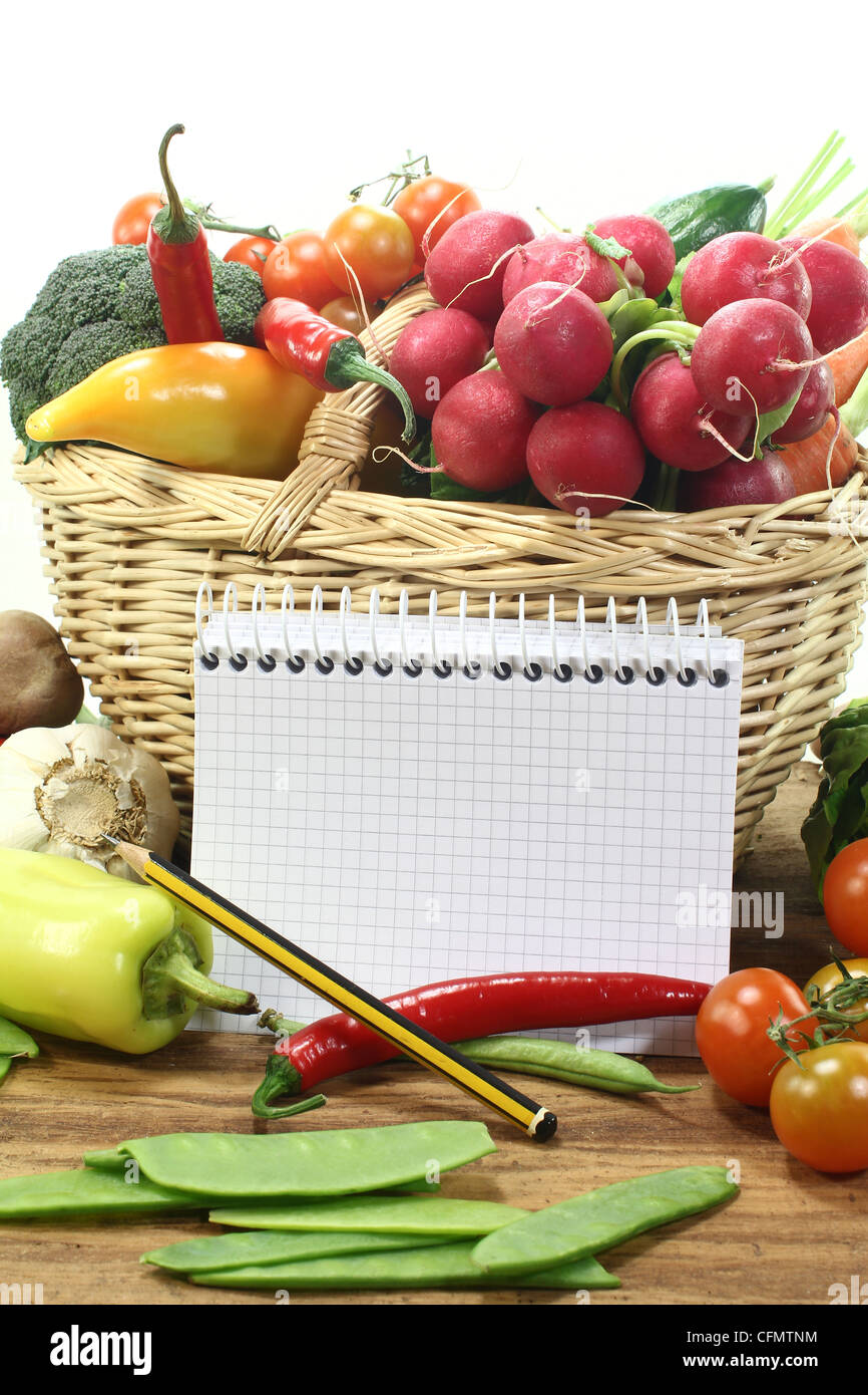plaid shopping list with fresh vegetables on wooden ground Stock Photo ...