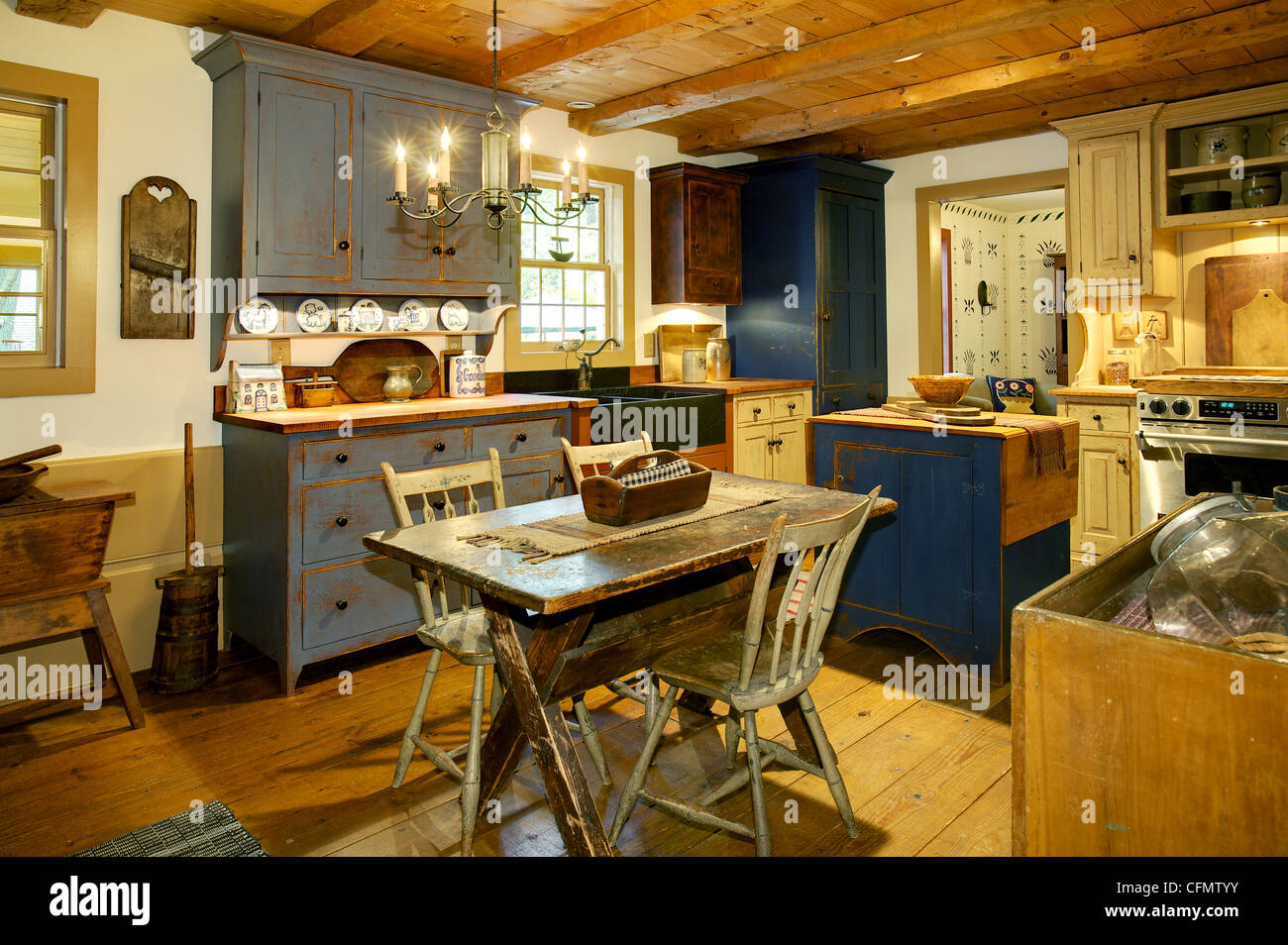 Primitive Colonial Kitchen in a reproduction home Stock Photo - Alamy
