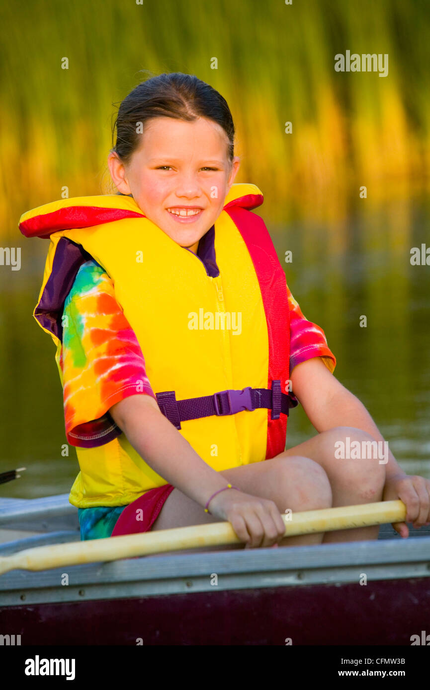 Girl in Canoe Stock Photo - Alamy