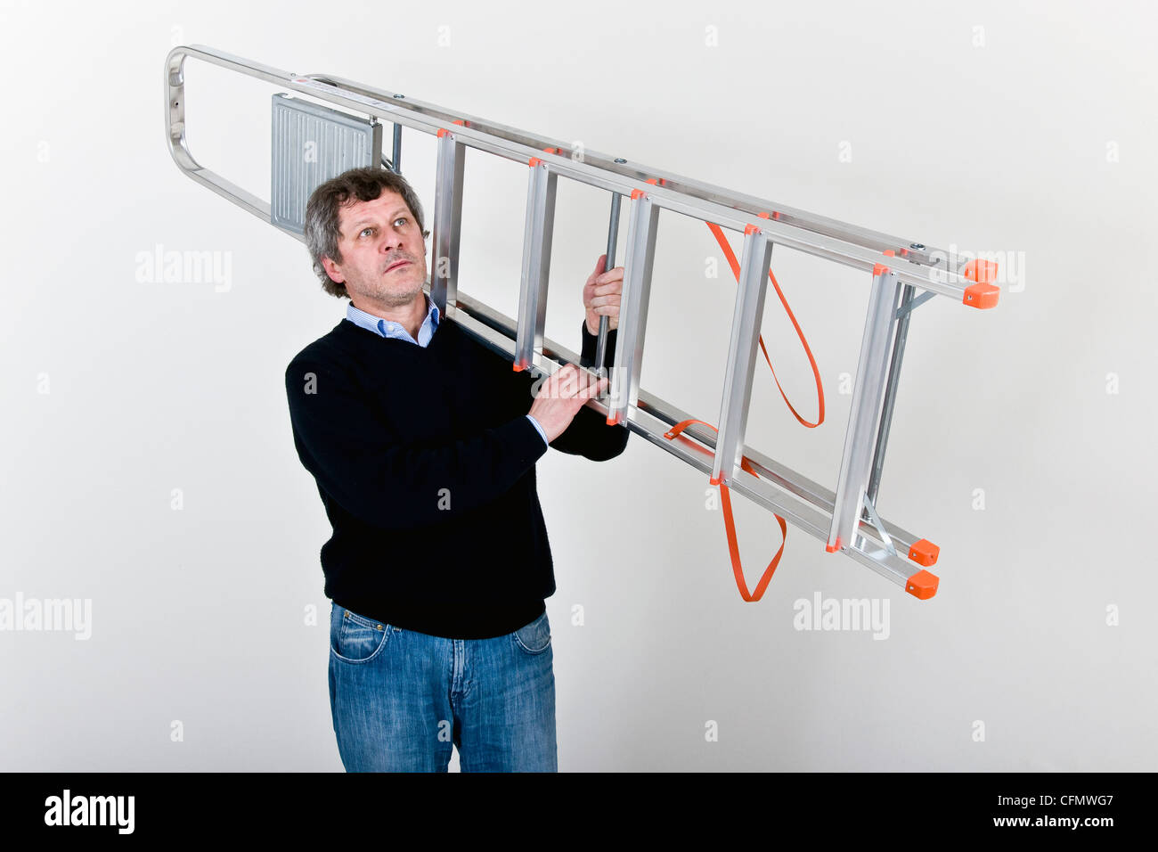 Man with ladder Stock Photo - Alamy