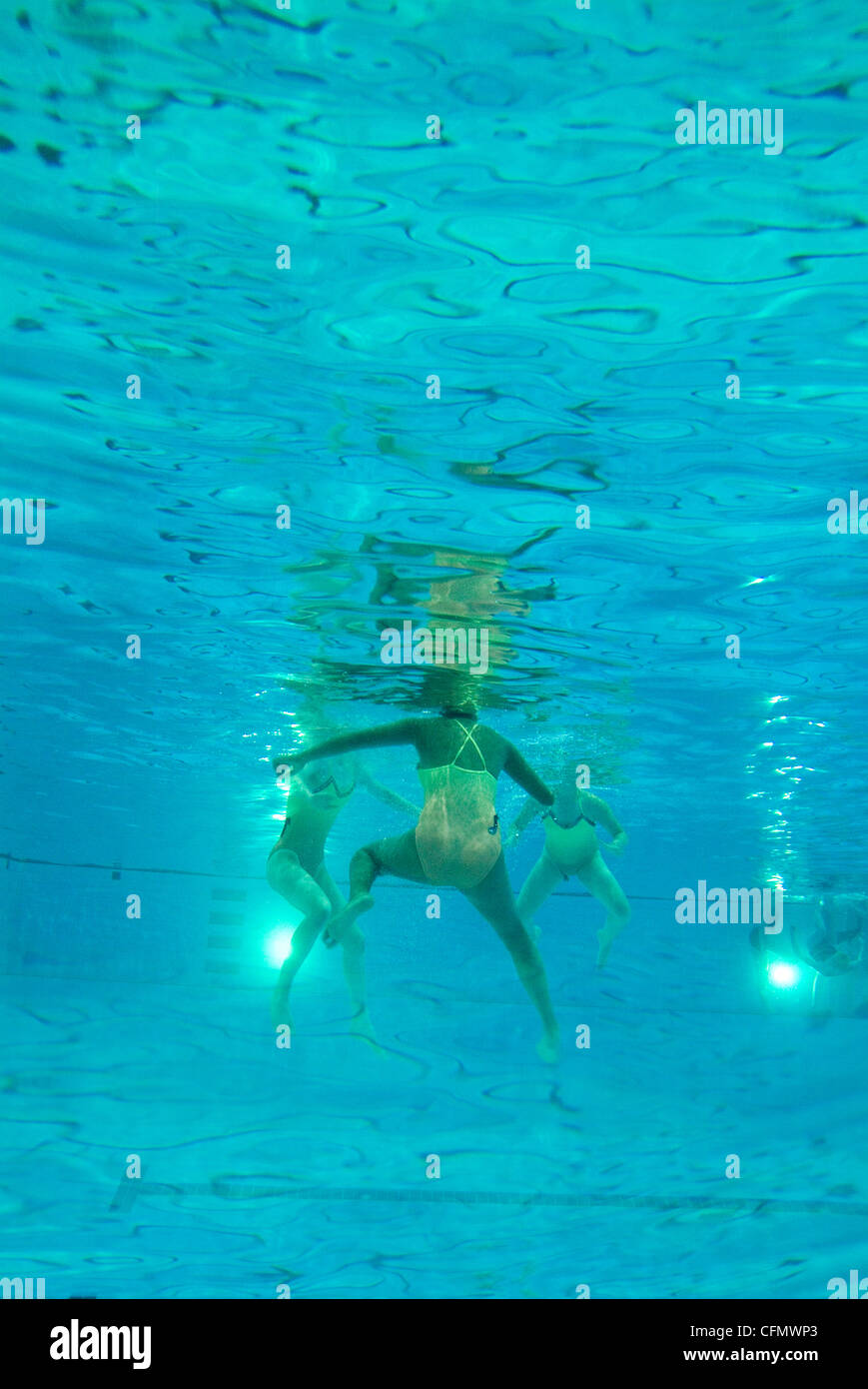 Synchronized swimmers underwater hi-res stock photography and images ...