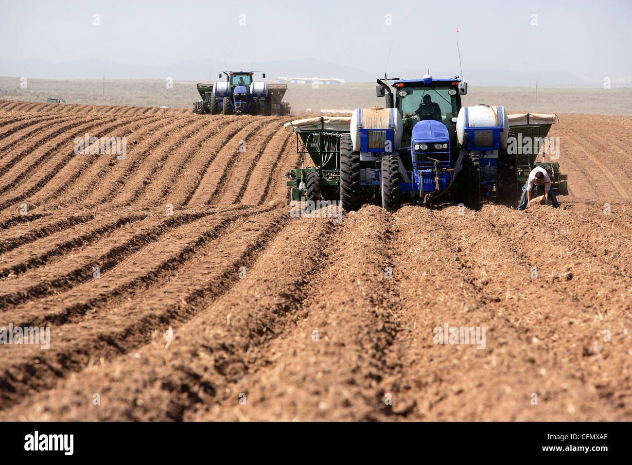Tractor and potato planting machine hi-res stock photography and images ...