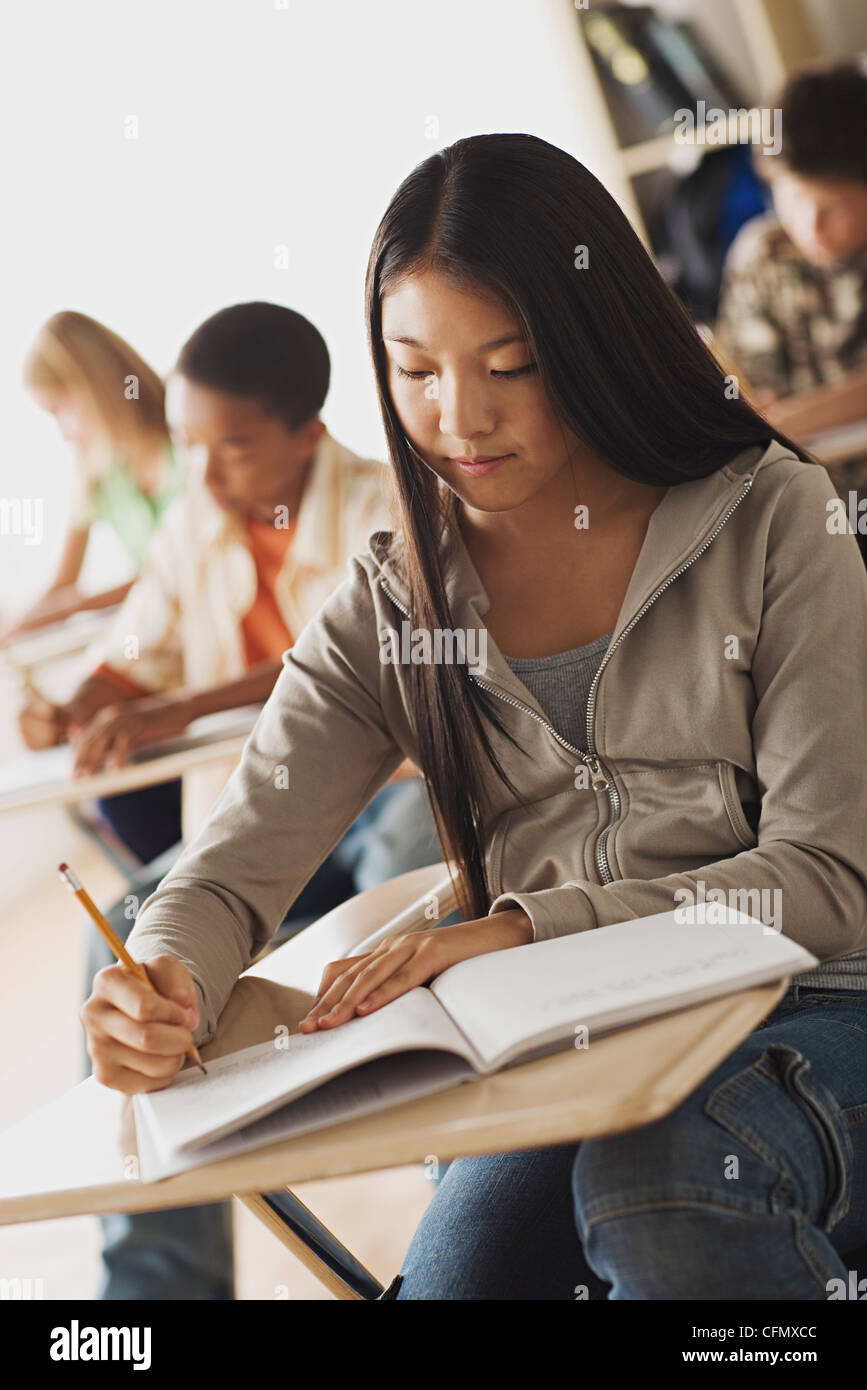 USA, California, Los Angeles, Class writing in their copy books Stock ...