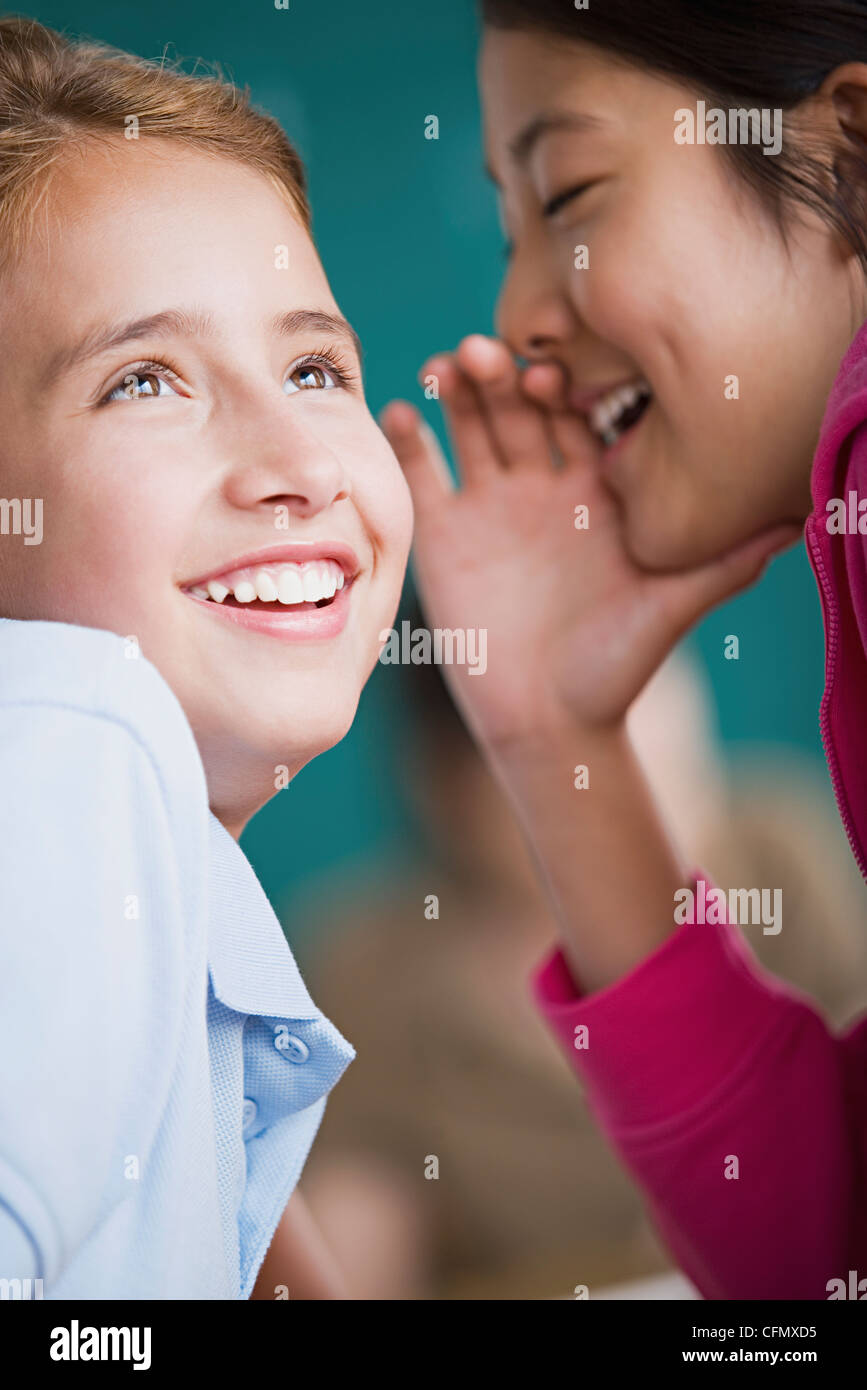 USA, California, Los Angeles, Two girls gossiping Stock Photo - Alamy