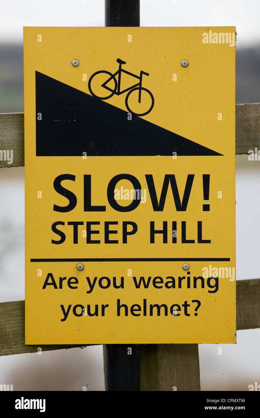 Slow Steep Hill Warning sign for cyclists Stock Photo - Alamy
