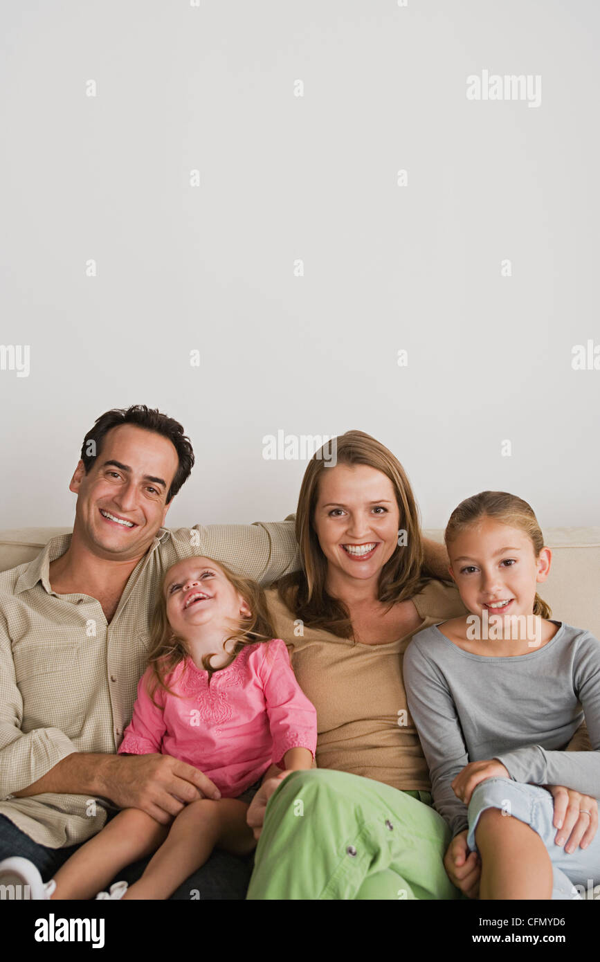 USA, California, Los Angeles, Smiling family with two daughters (8-9 ...