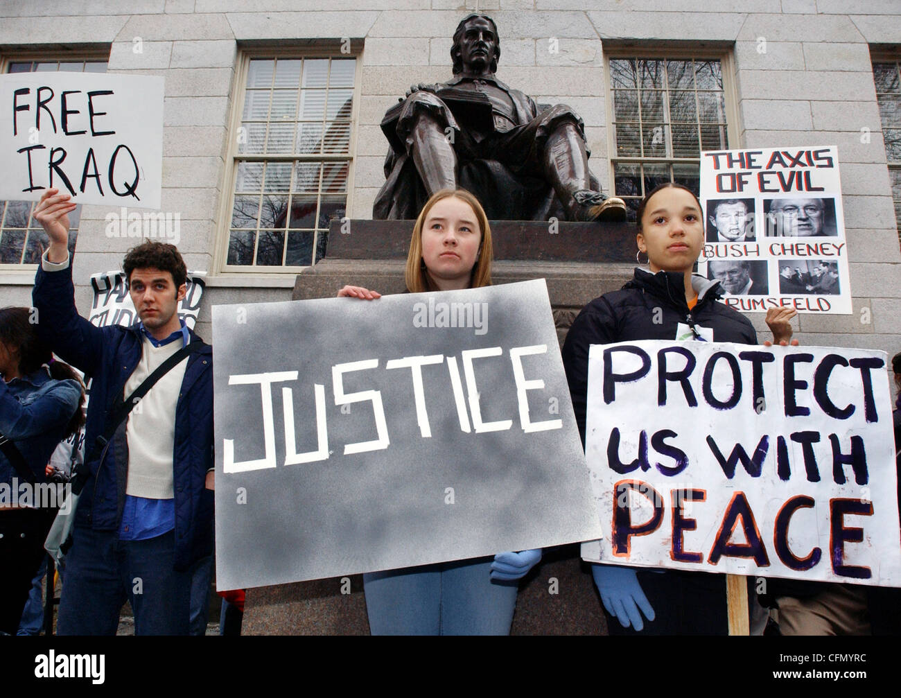 Students demonstrate in front the the John Harvard statue in Harvard ...