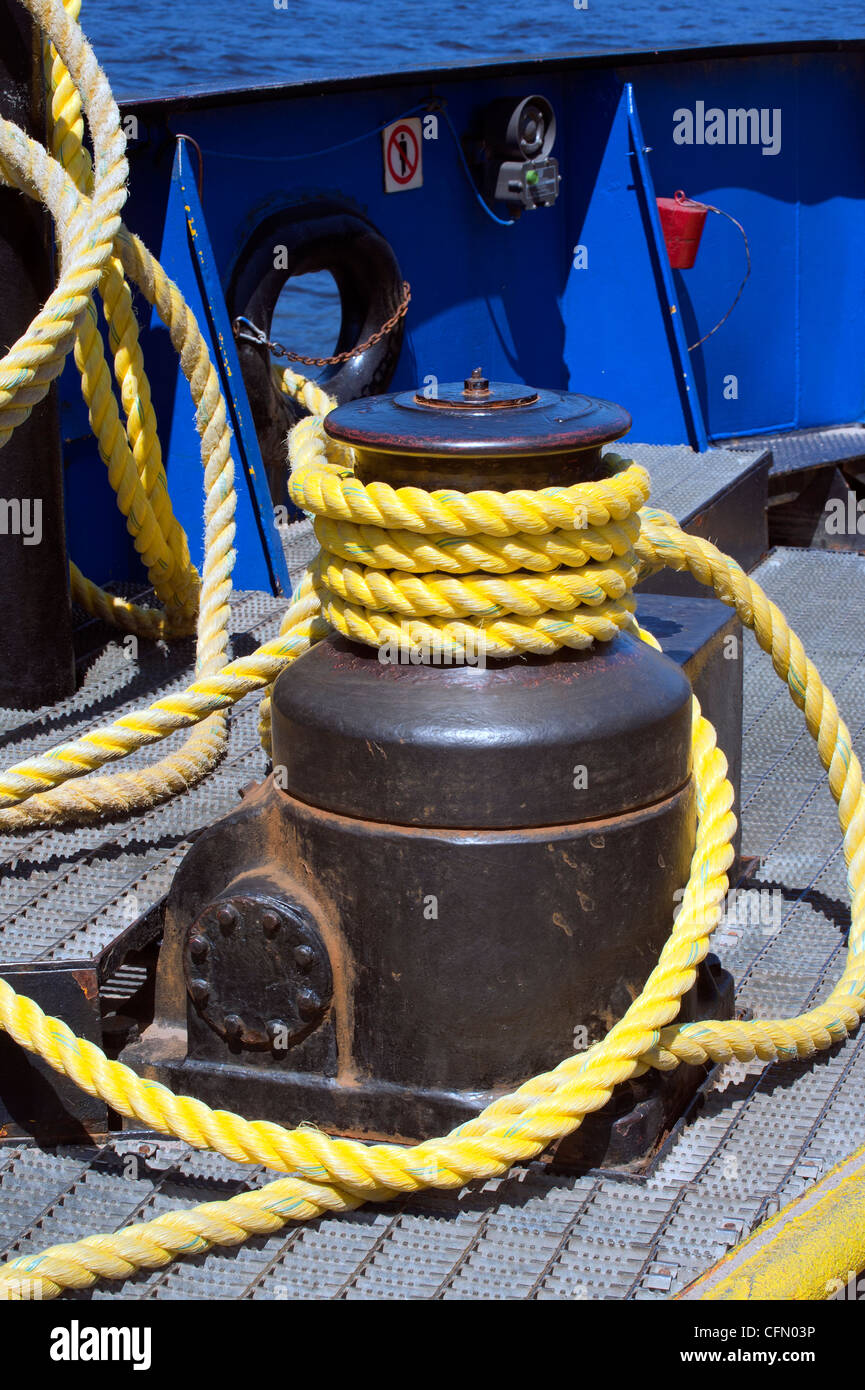 Yellow marine rope wrapped around a capstan on a ferry Stock Photo - Alamy
