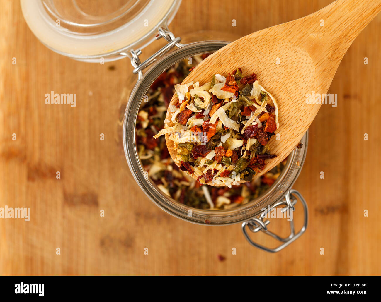mixture spice in a wooden spoon, closeup Stock Photo - Alamy
