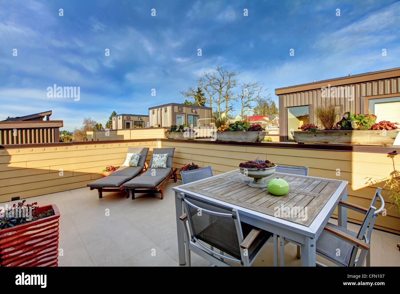 Apartment building roof top terrace exterior with modern living area ...