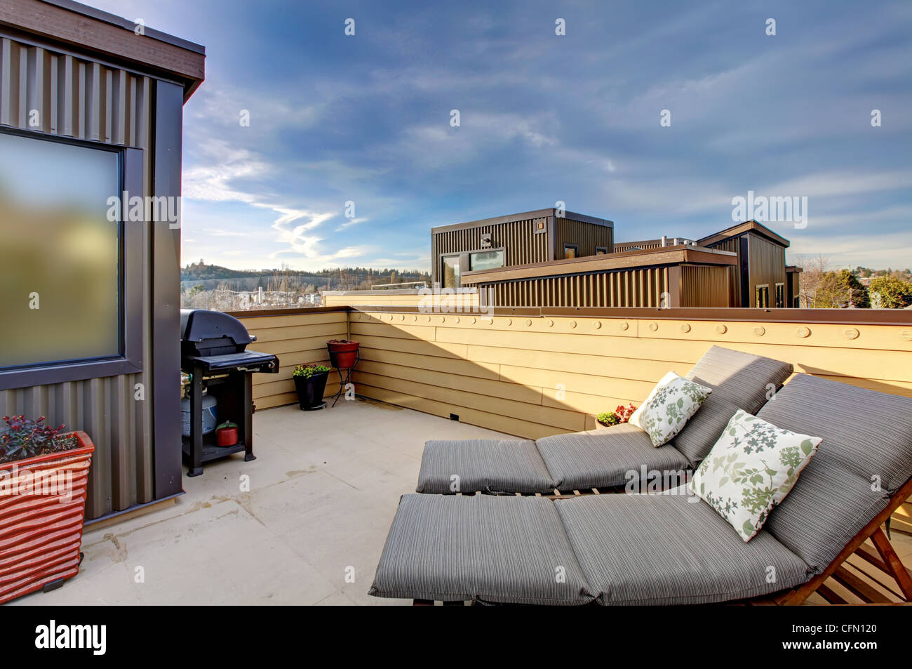 Apartment building roof top terrace exterior with modern living area ...