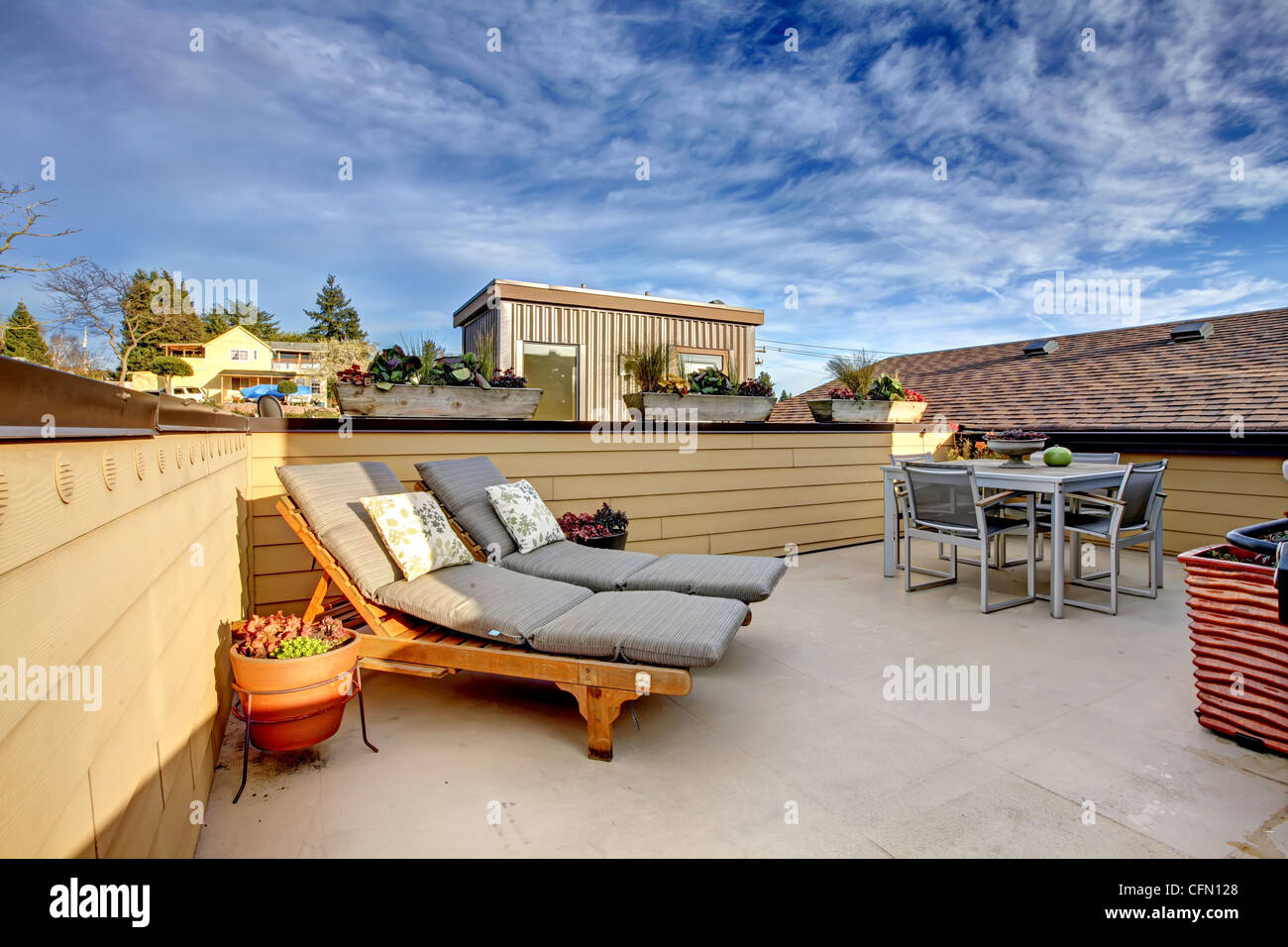 Apartment building roof top terrace exterior with modern living area ...