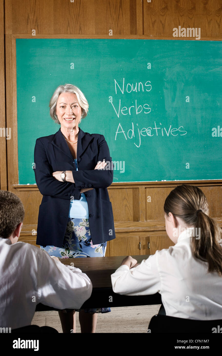 Teacher Infront of Classroom Stock Photo - Alamy