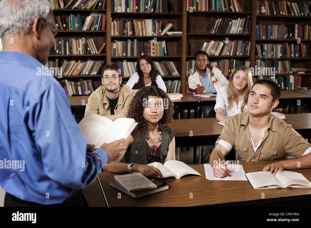 Teacher Reading to Class Stock Photo - Alamy