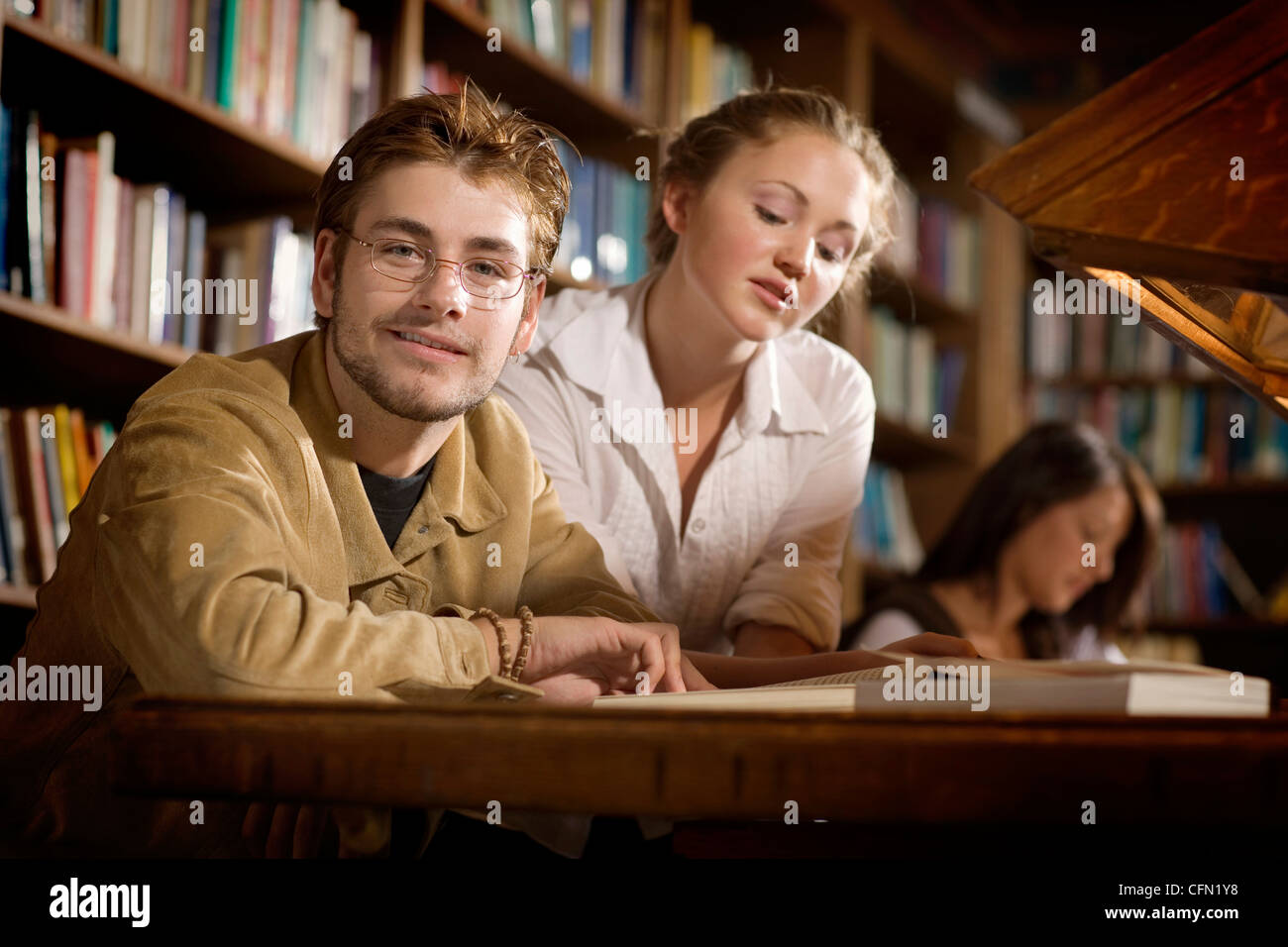 Students Studying in Library Stock Photo - Alamy