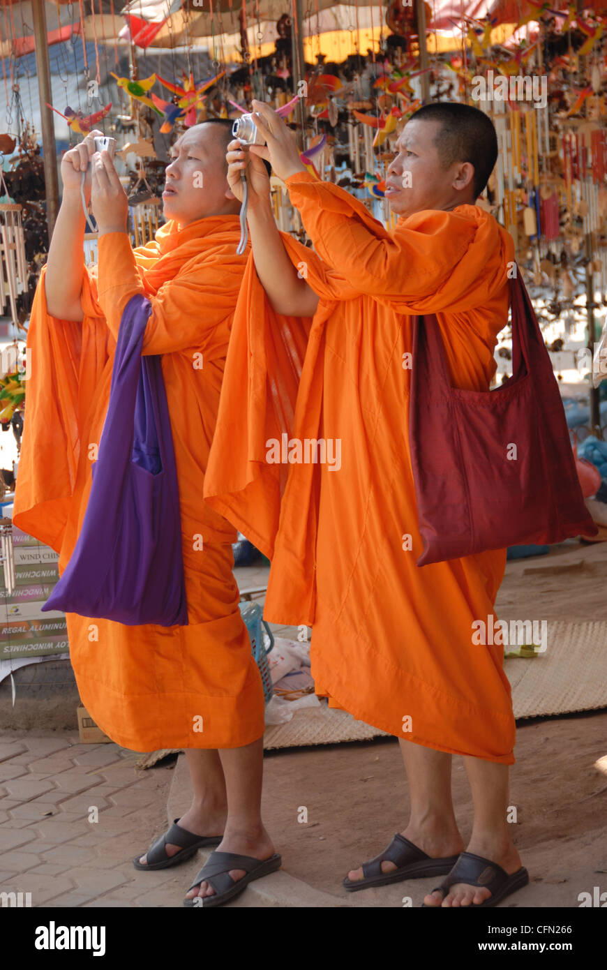 Two monks taking photo`s at the Golden Triangle Chiang Rai Northern ...