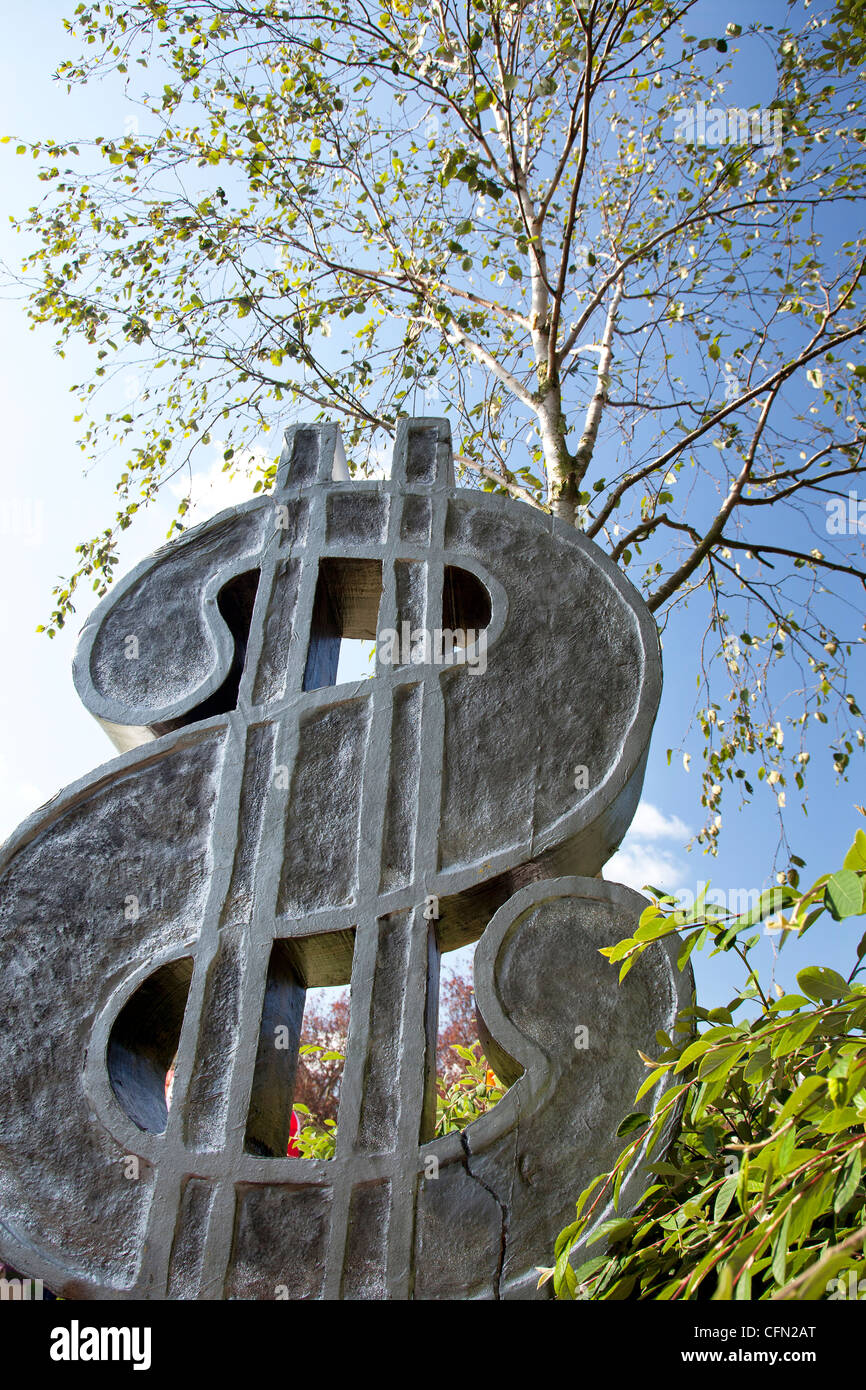 Dollar or peso sculpture Stock Photo - Alamy