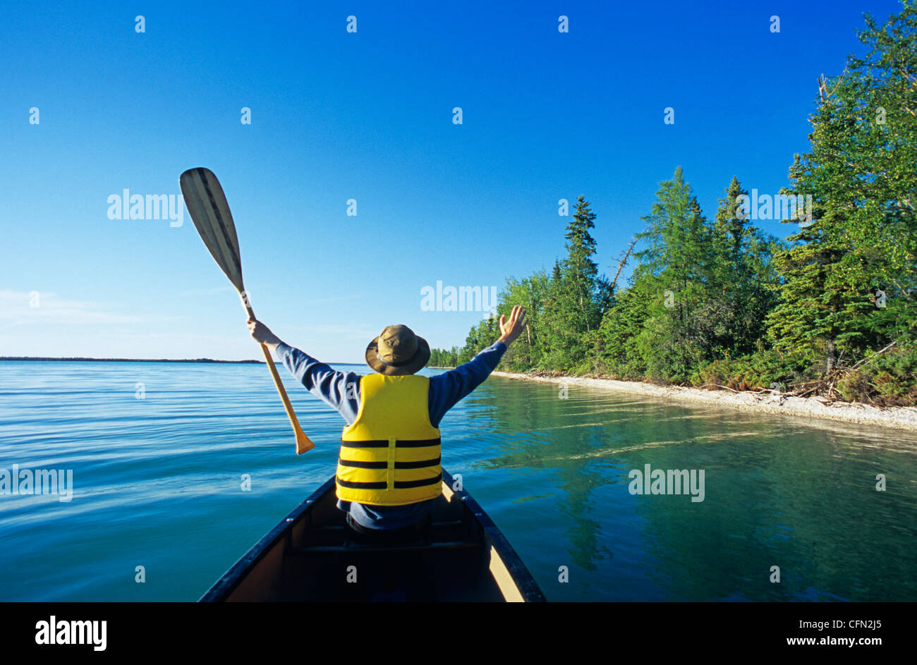 Canoeist on Little Limestone Lake, Northern Manitoba Stock Photo - Alamy