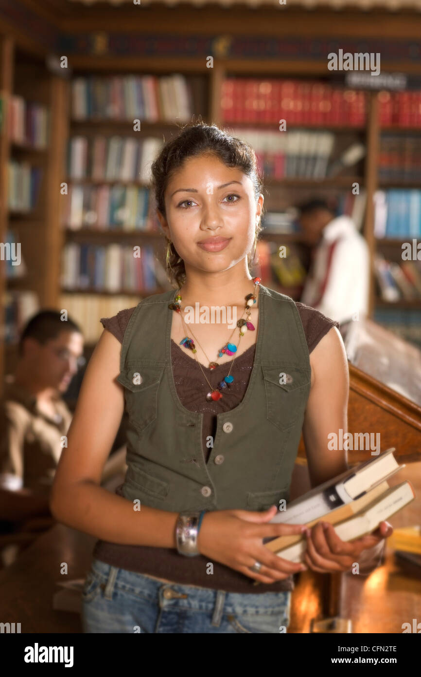 Female Student in Library Stock Photo - Alamy