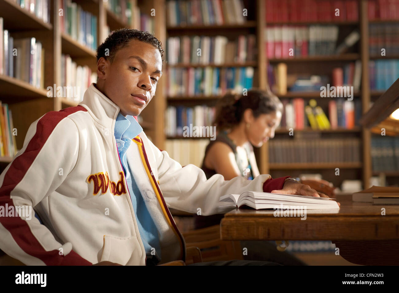 Students Reading in Library Stock Photo - Alamy