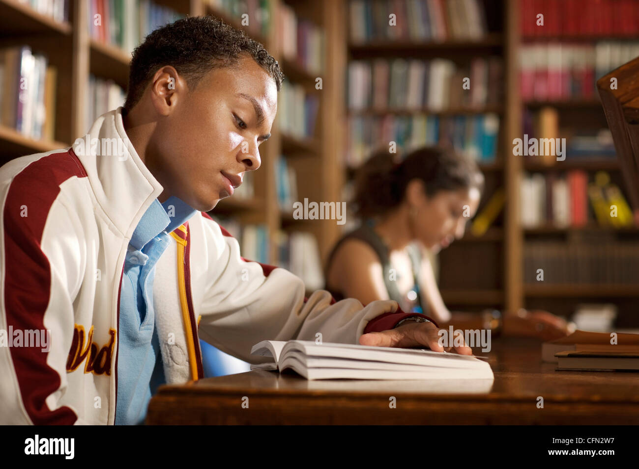Students Reading in Library Stock Photo - Alamy