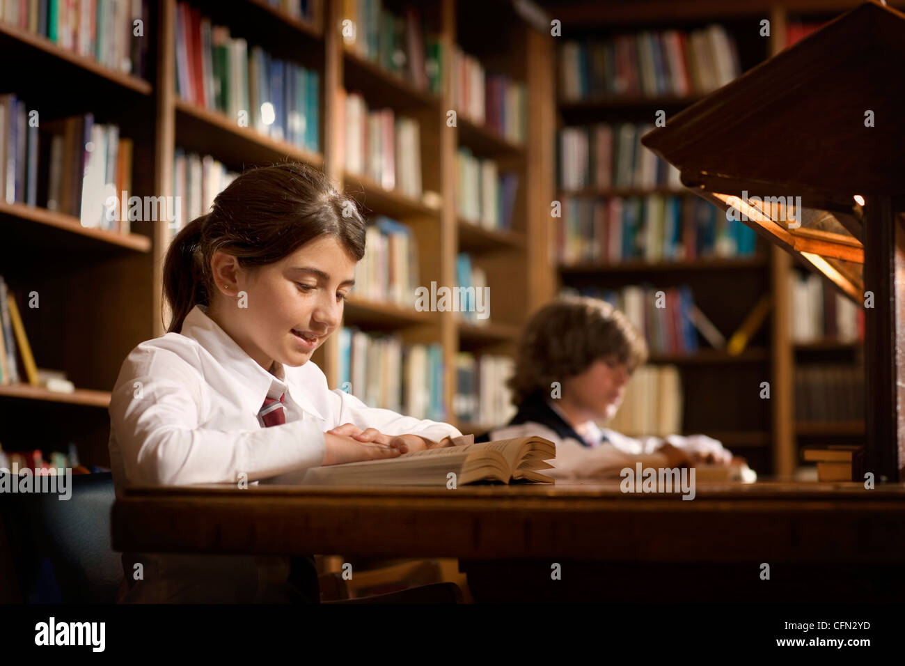 Students Reading in Library Stock Photo - Alamy