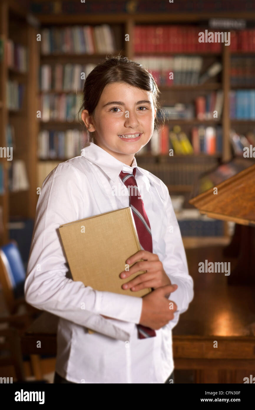 Female Student in Library Stock Photo - Alamy