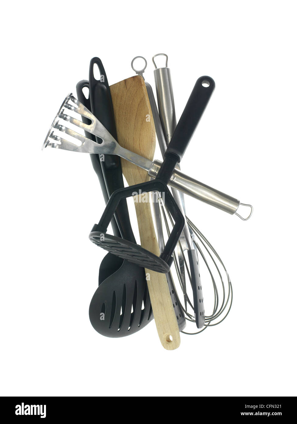 Kitchen utensils isolated against a white background Stock Photo - Alamy