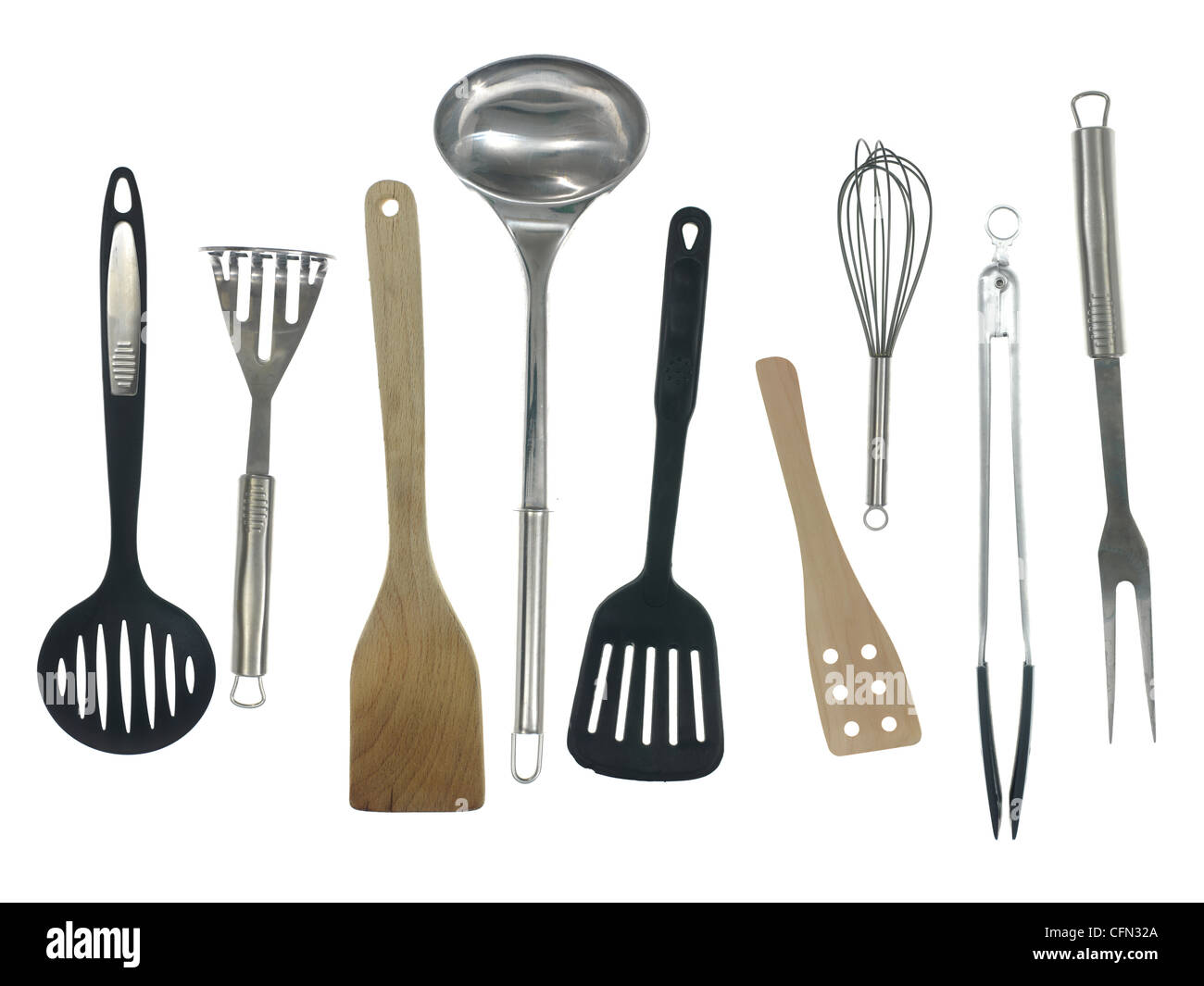 Kitchen utensils isolated against a white background Stock Photo - Alamy