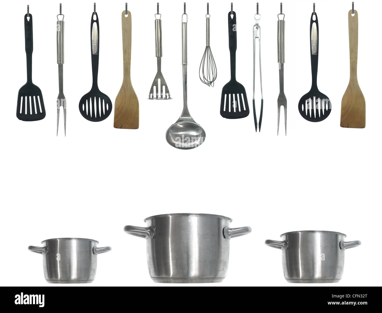 Kitchen utensils isolated against a white background Stock Photo - Alamy