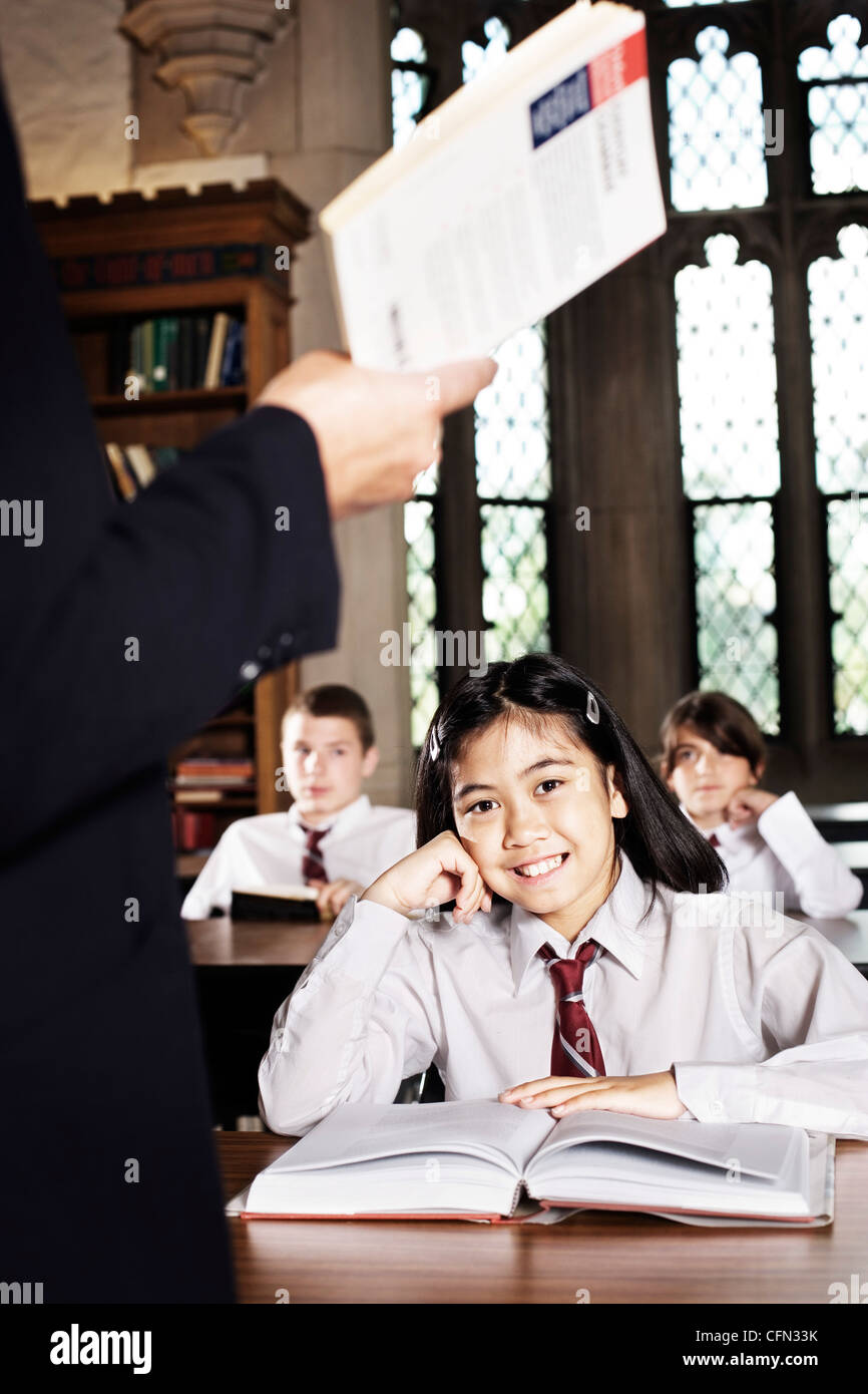 Teacher Reading to Class Stock Photo - Alamy