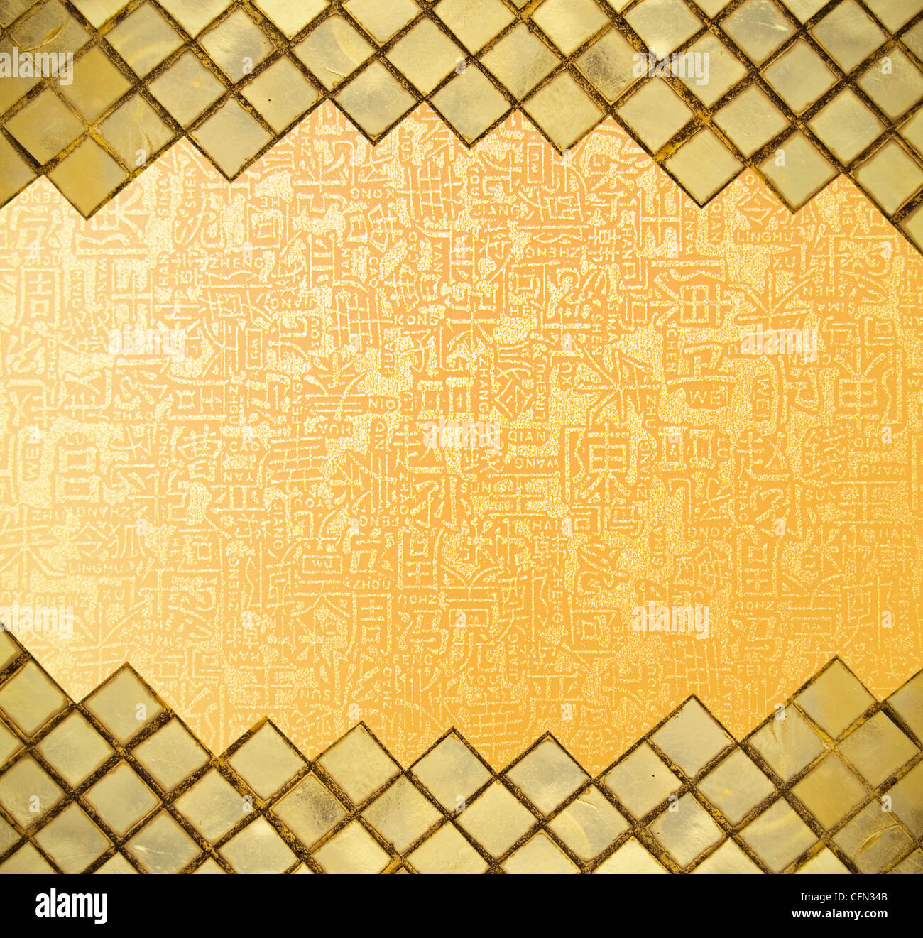 Golden mosaic with chinese letters Stock Photo - Alamy