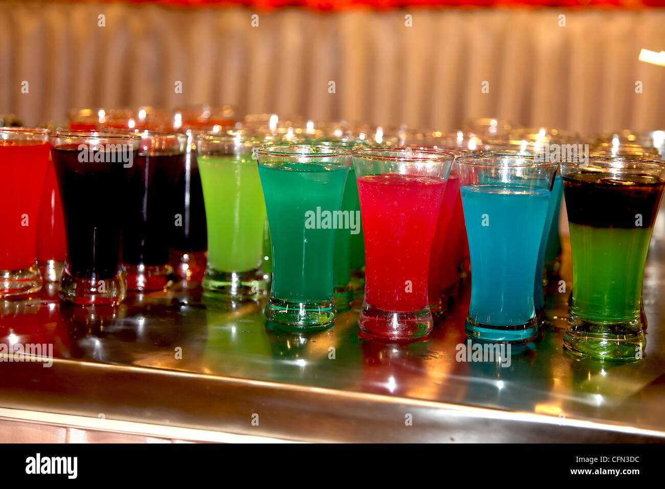 Fresh fruit juice and cold drink serving in the party Stock Photo - Alamy